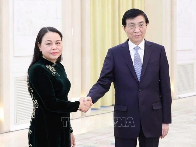 Vietnam, China boost front work cooperation